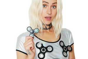 Suggestive Toy-Themed Costumes : fidget spinner costume