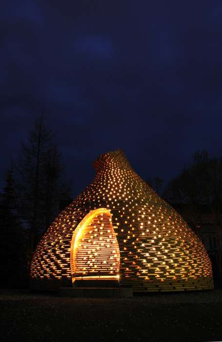 Giant Outfoor Fireplaces: A Circular Wooden Fire Hut by Haugen Zohar ...