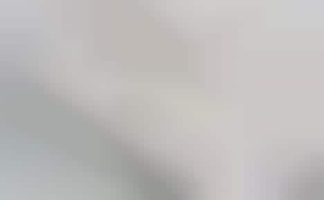 Low-Tech Zoomable Maps: Map Squared Unfolds to Detailed Areas