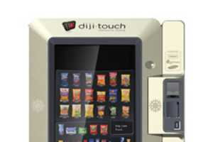 Cashless Robotic Retailers : Biometric Vending Machines